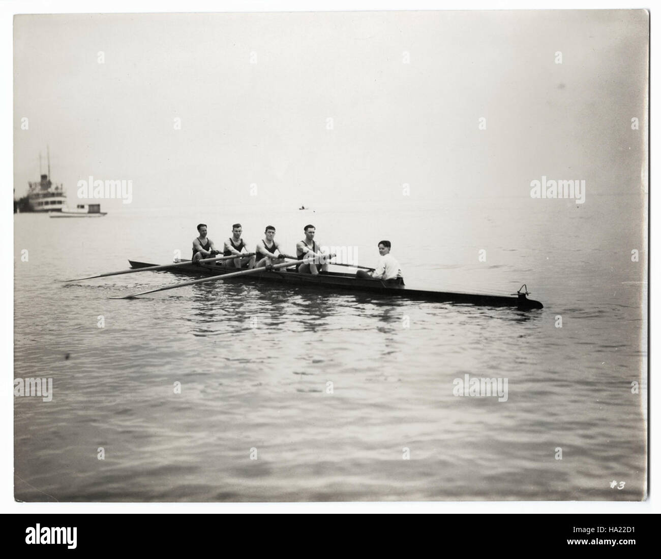 A historical photo from 1929 shows a four-man crew in a coxed sweep ...