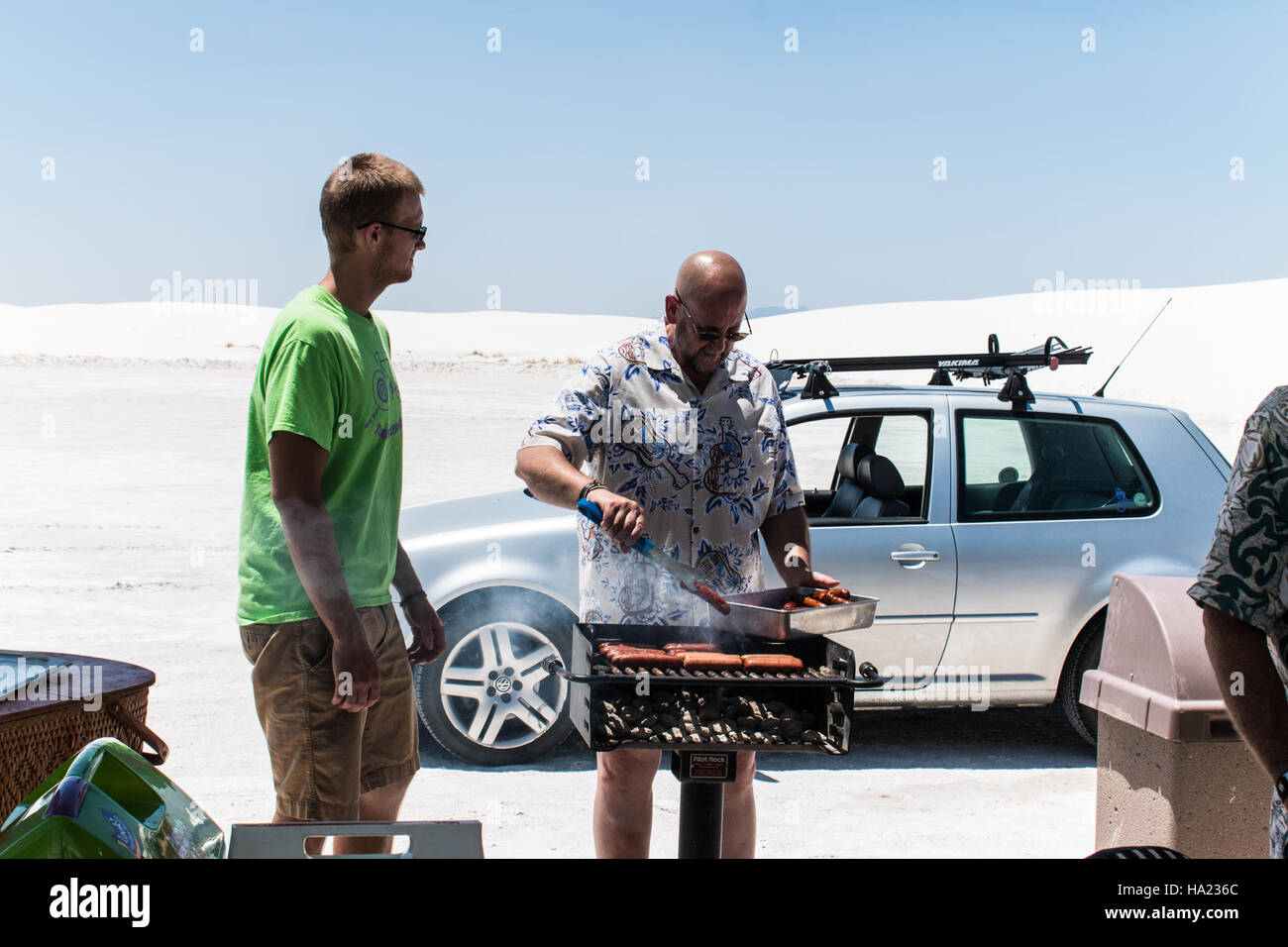 A photo showcasing a grilling activity within a park, emphasizing ...