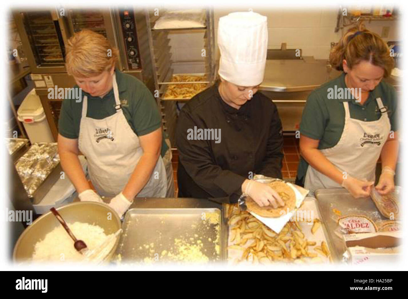 Chef Brenda is pictured with her foodservice staff, emphasizing the ...
