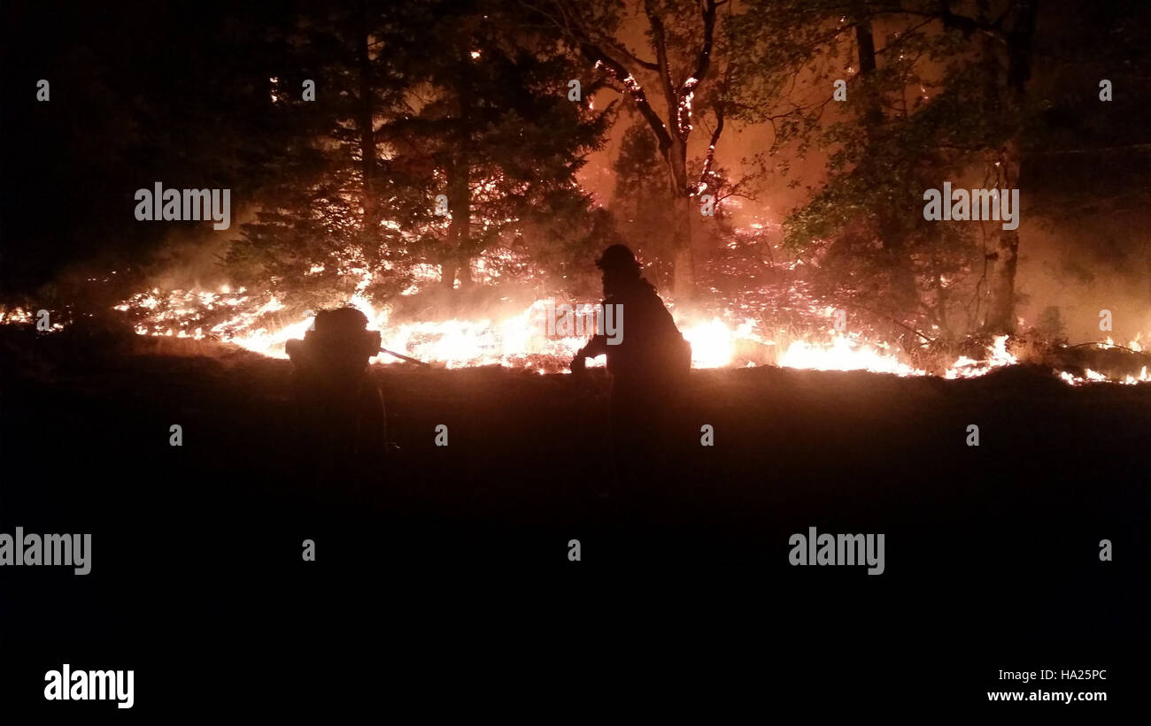 This image shows the aftermath of a wildfire in California ...