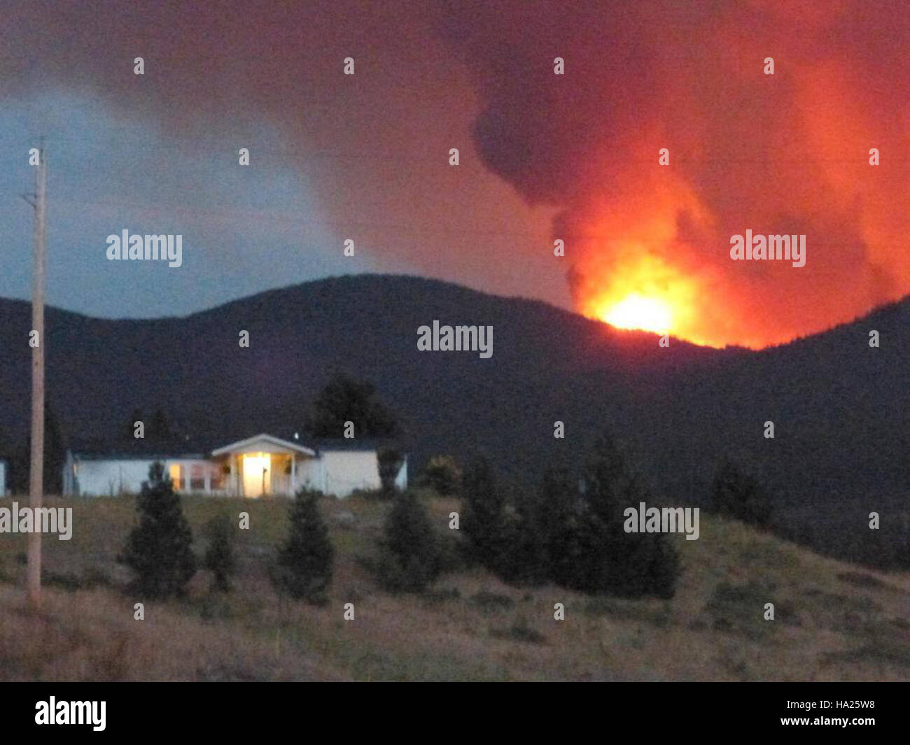 A wildfire burns in Washington, showing the challenges of managing fire ...