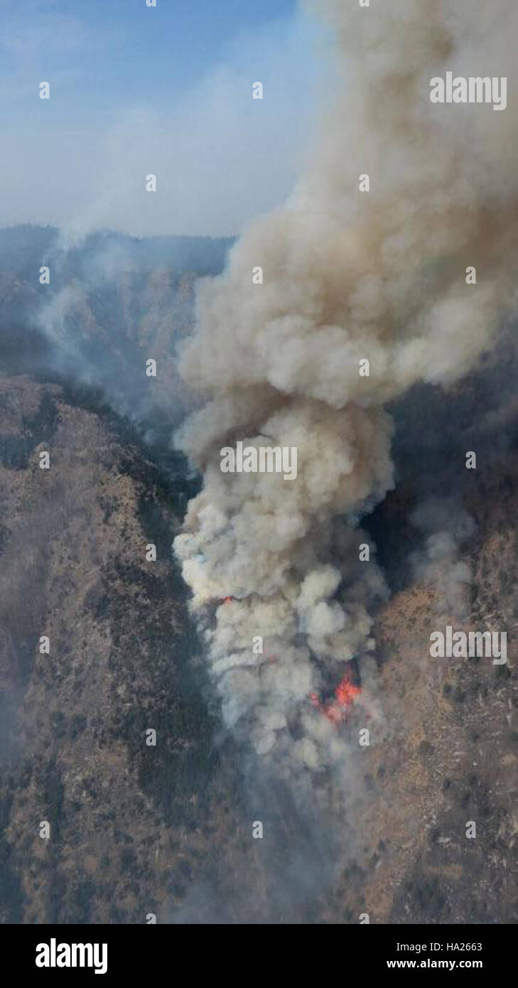 This image depicts the aftermath of a wildfire in California ...