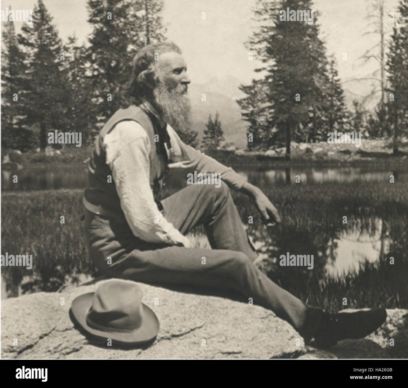usdagov 25890799841 John Muir sitting on a rock Stock Photo - Alamy