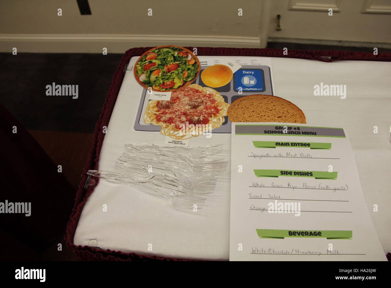 A school meal tray featuring spaghetti with meatballs, part of the ...
