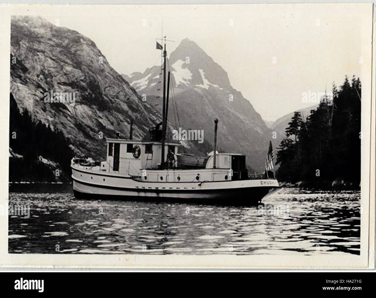 This historic photograph features the M/V Chugach ranger boat, a vital ...