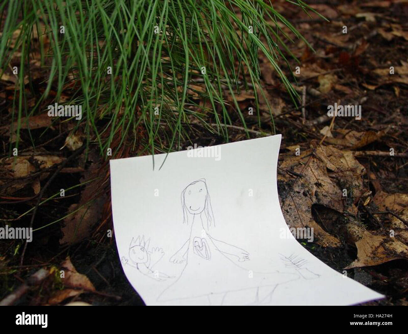 A touching tribute to 9/11, a child survivor places a drawing at a ...