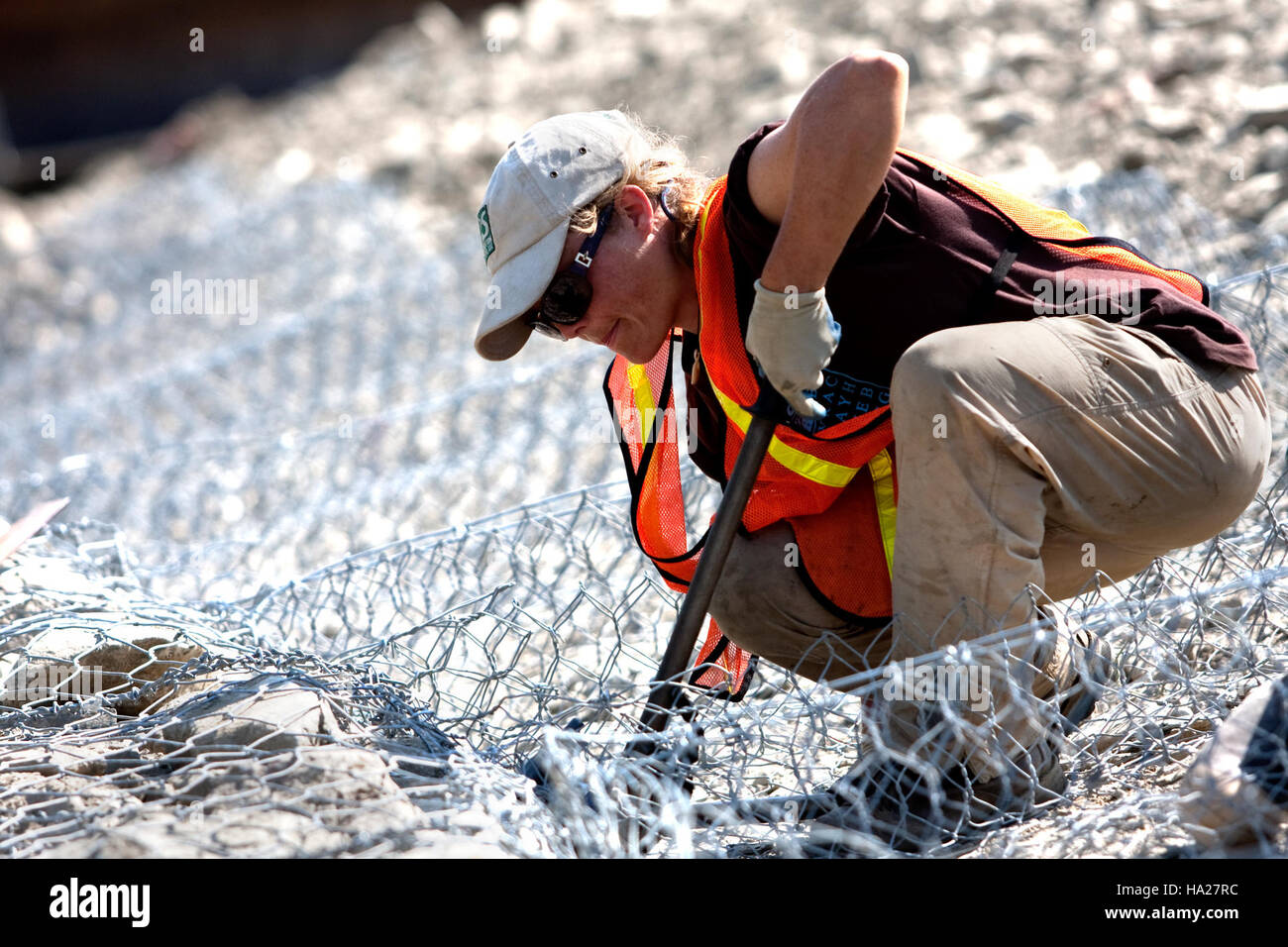 This image features a construction worker at Denali National Park, part ...