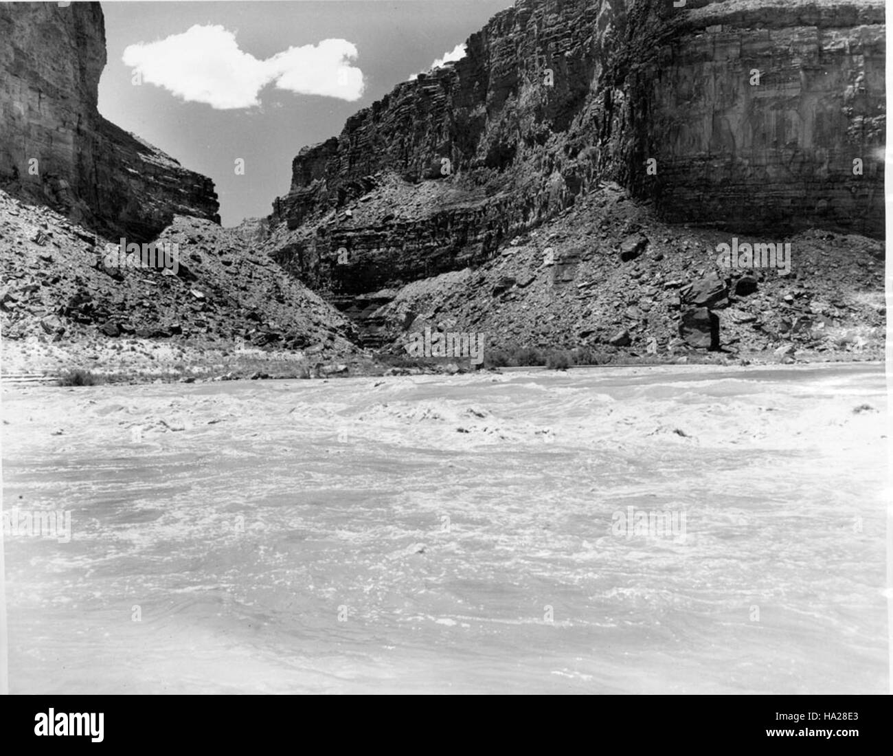 A historic photograph of the Colorado River flowing through the Grand ...