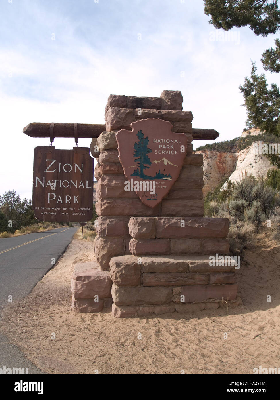The Zion National Park entrance sign marks the beginning of a scenic ...