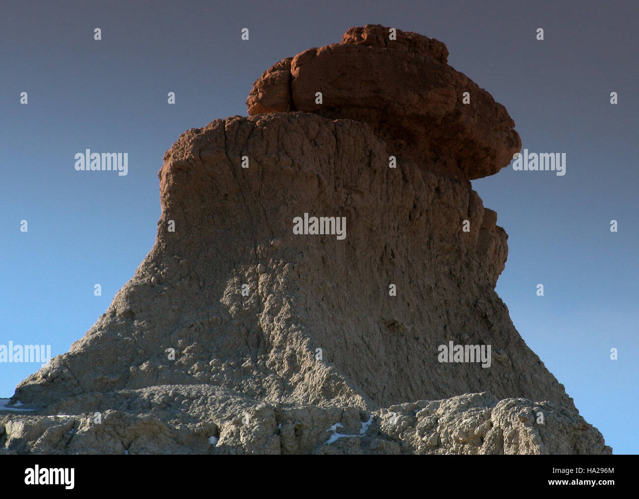 Caprock in Badlands National Park is a prominent geological feature ...