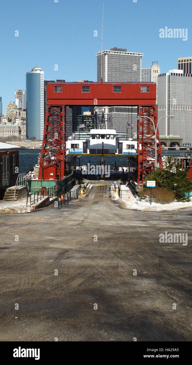 A ferry docks at Governors Island National Park, providing access to ...