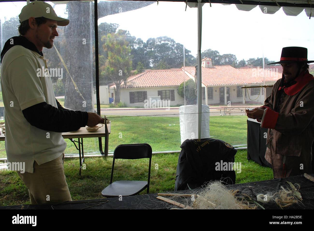 This image shows the traditional craft of rope-making, part of a ...