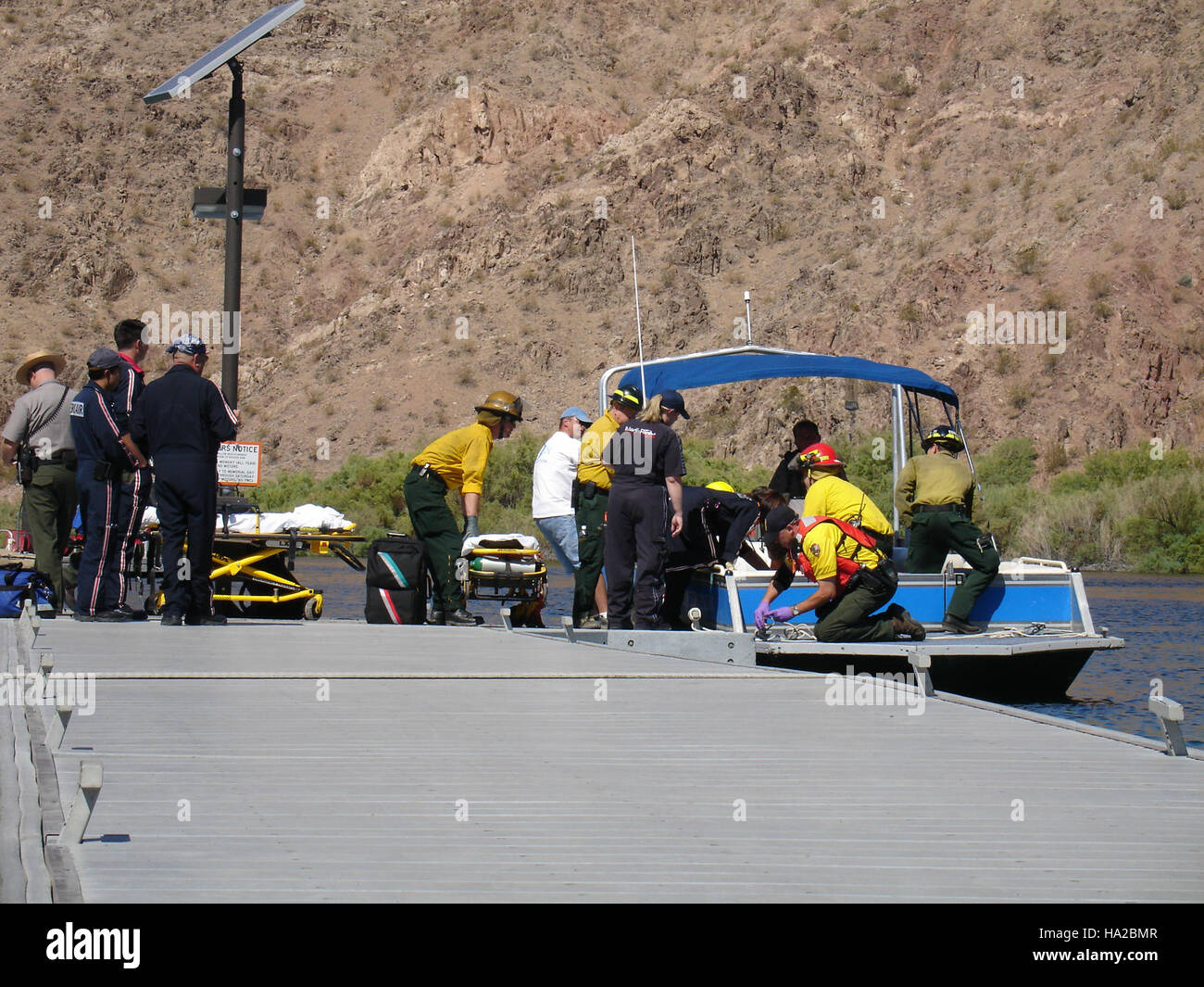 A boat grounded on the Colorado River near Lake Mead, requiring a ...