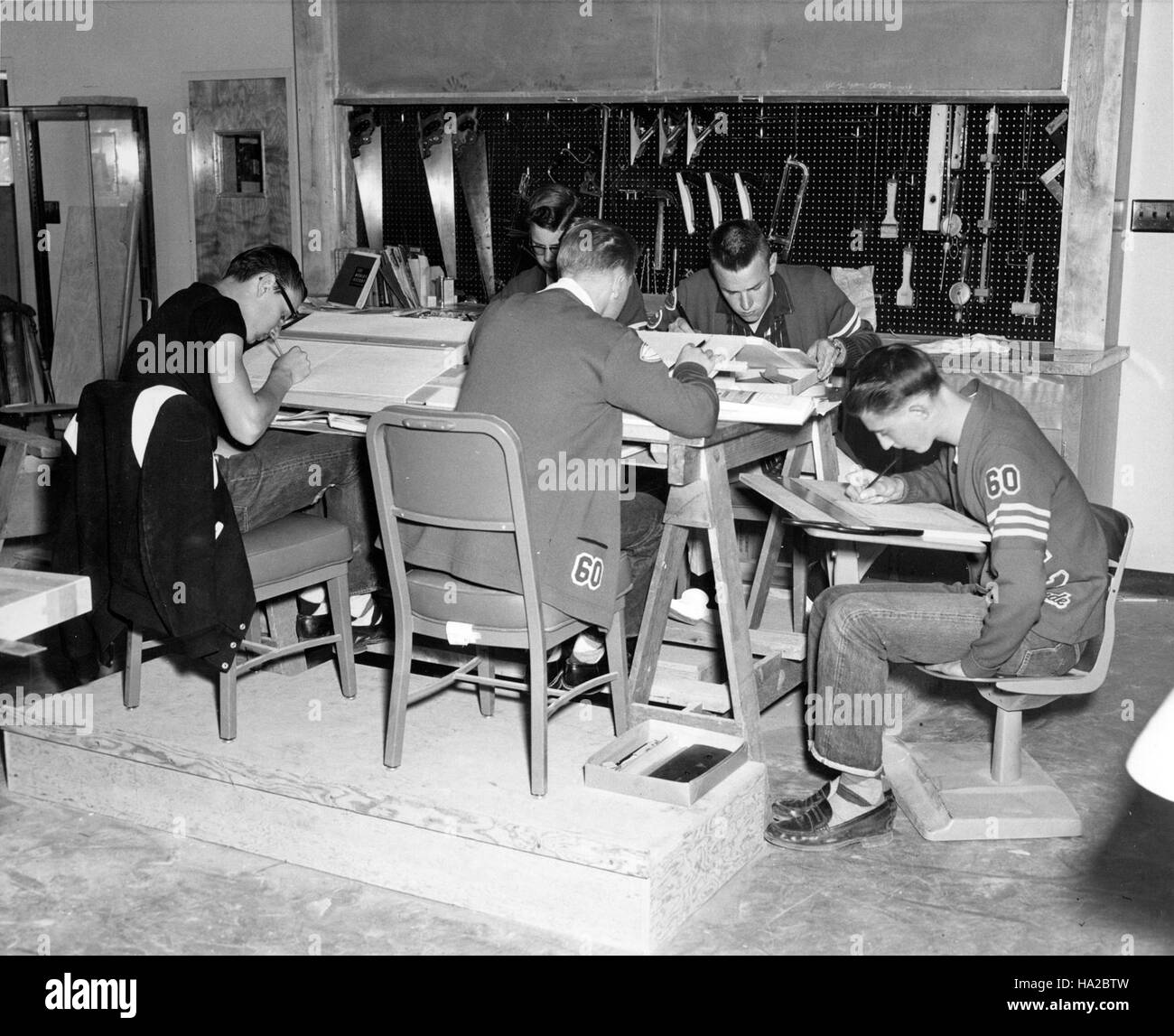 This historic photograph from 1959 shows students in a drafting class ...