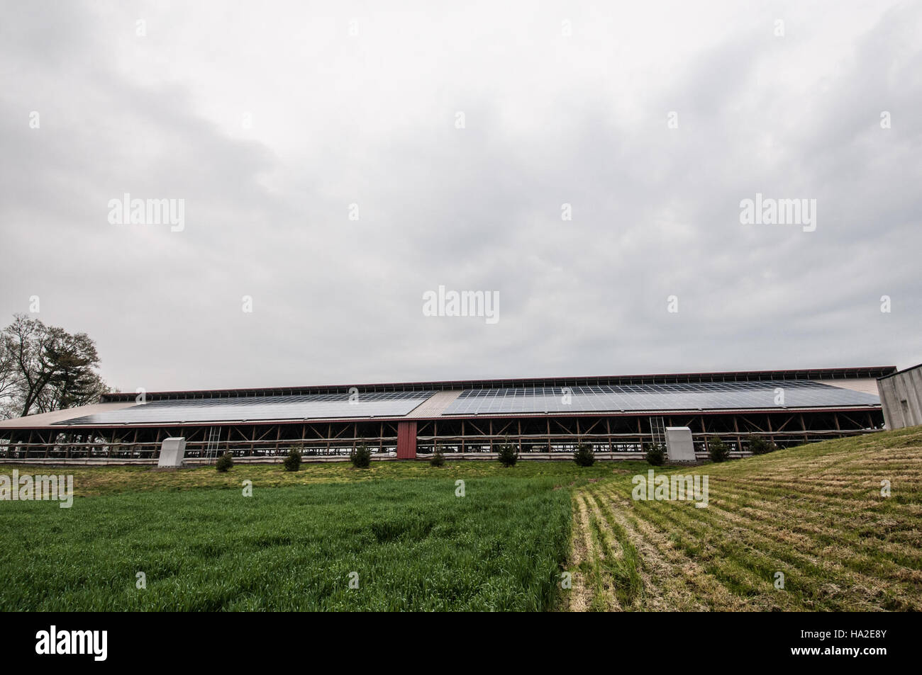 This image shows a biodigester system on a farm that processes waste ...