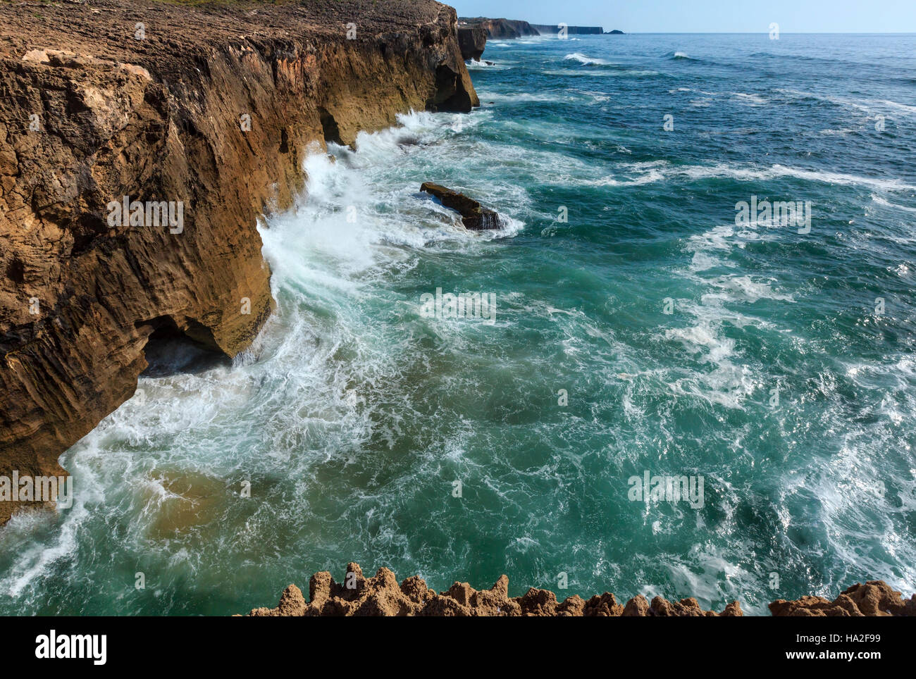 Waves breaking on rocky coast. View from above Stock Photo - Alamy