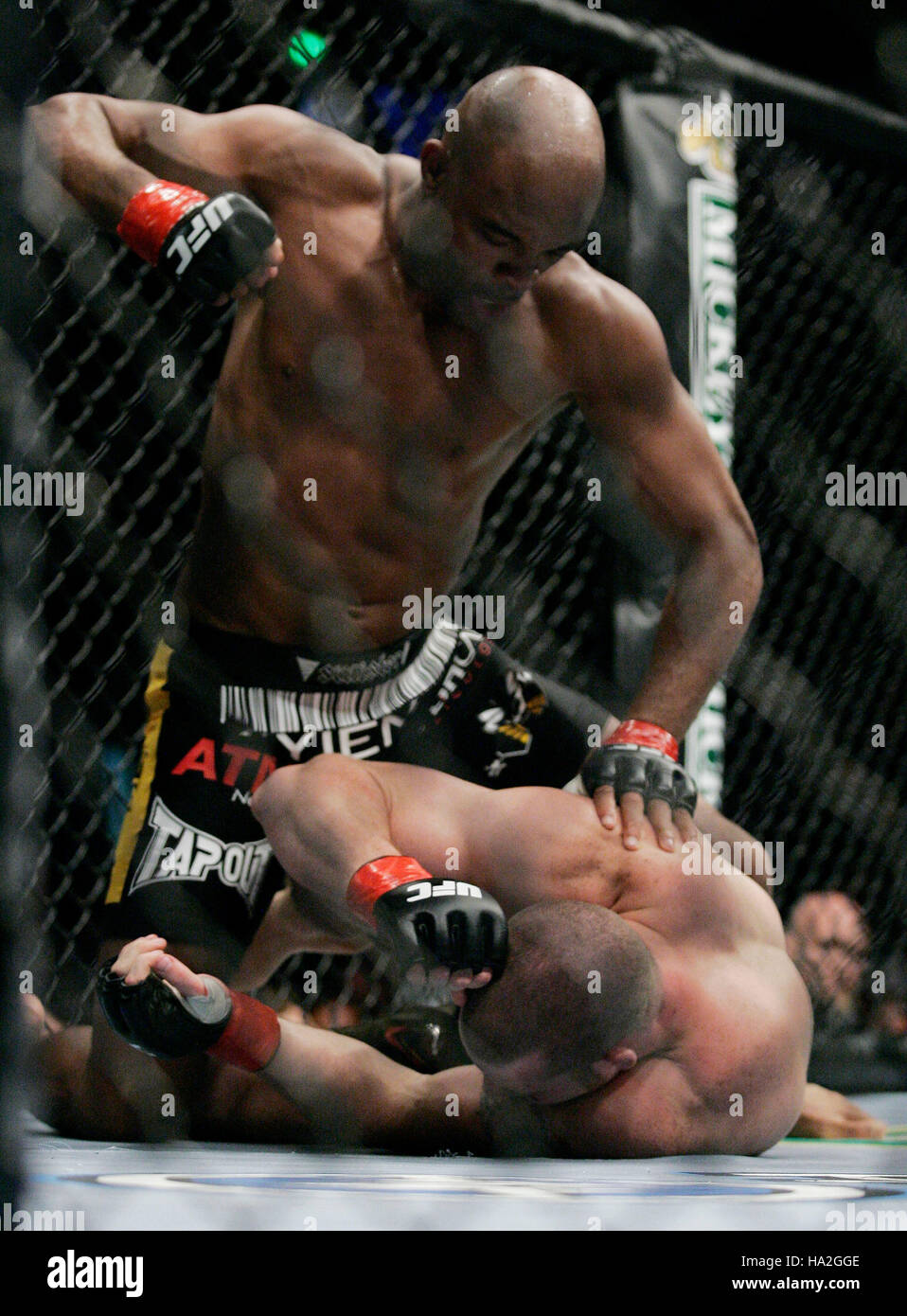 Anderson Silva, top, punches Nate Marquardt into submission during UFC ...