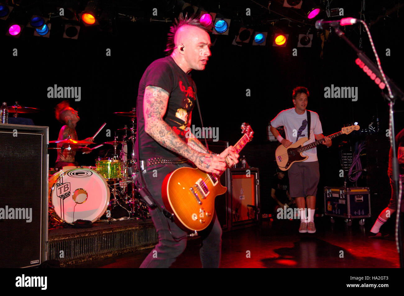 Travis Barker, Craig Fairbaugh, Mark Hoppus of +44 performs on stage at ...