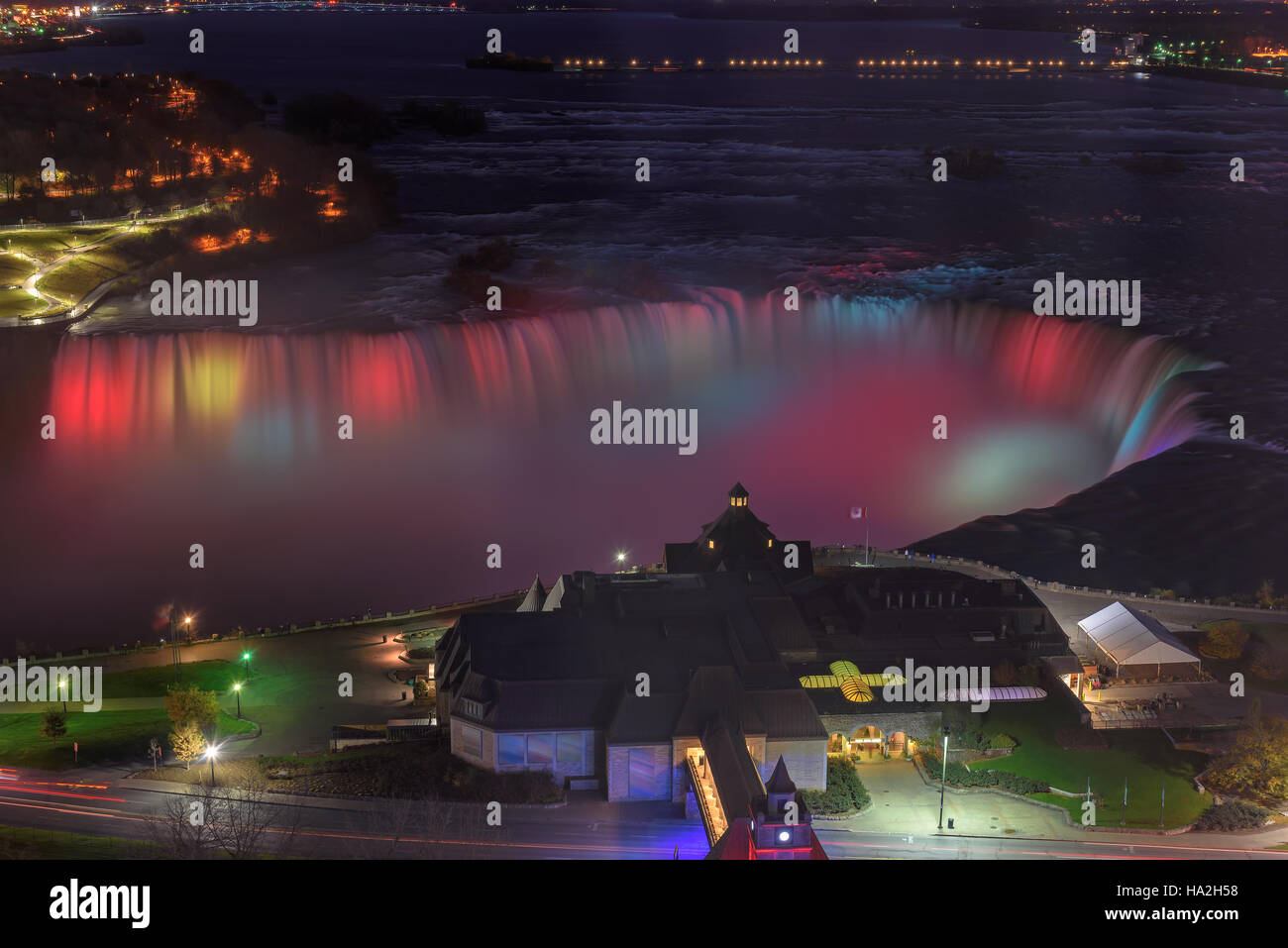 Aerial view Niagara Falls lit at night by colorful lights Stock Photo ...