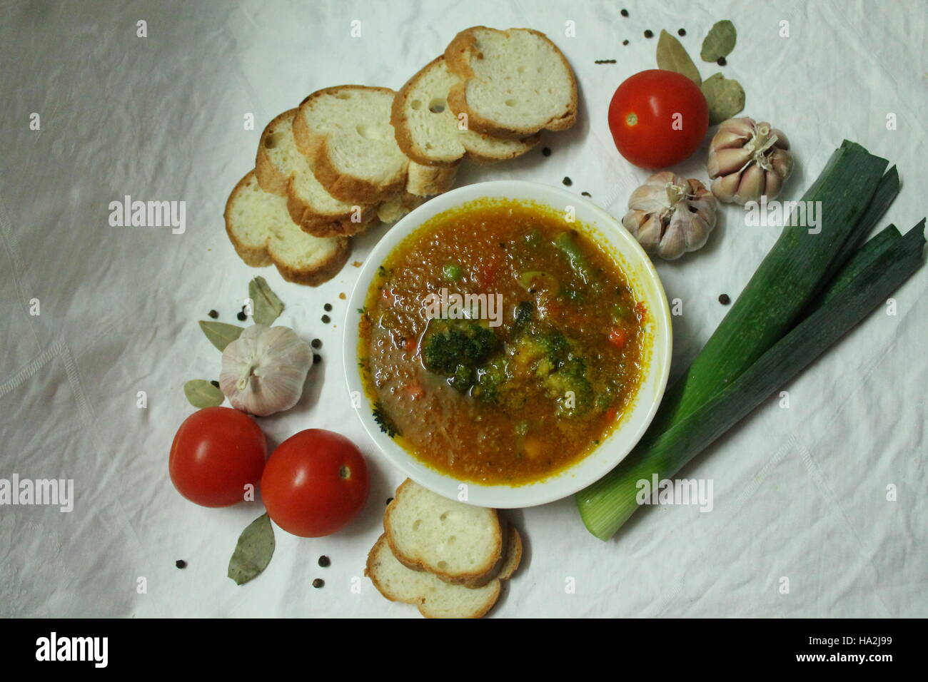 bright fresh hot soup from juicy pulp vegetables in bowl with spicy ...