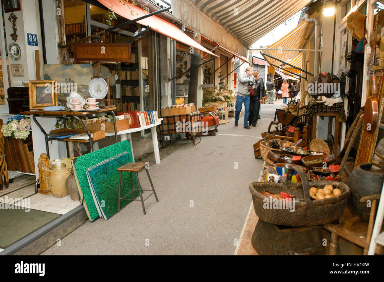 Paris, France - 3 November 2002: People shopping at the flea market of ...