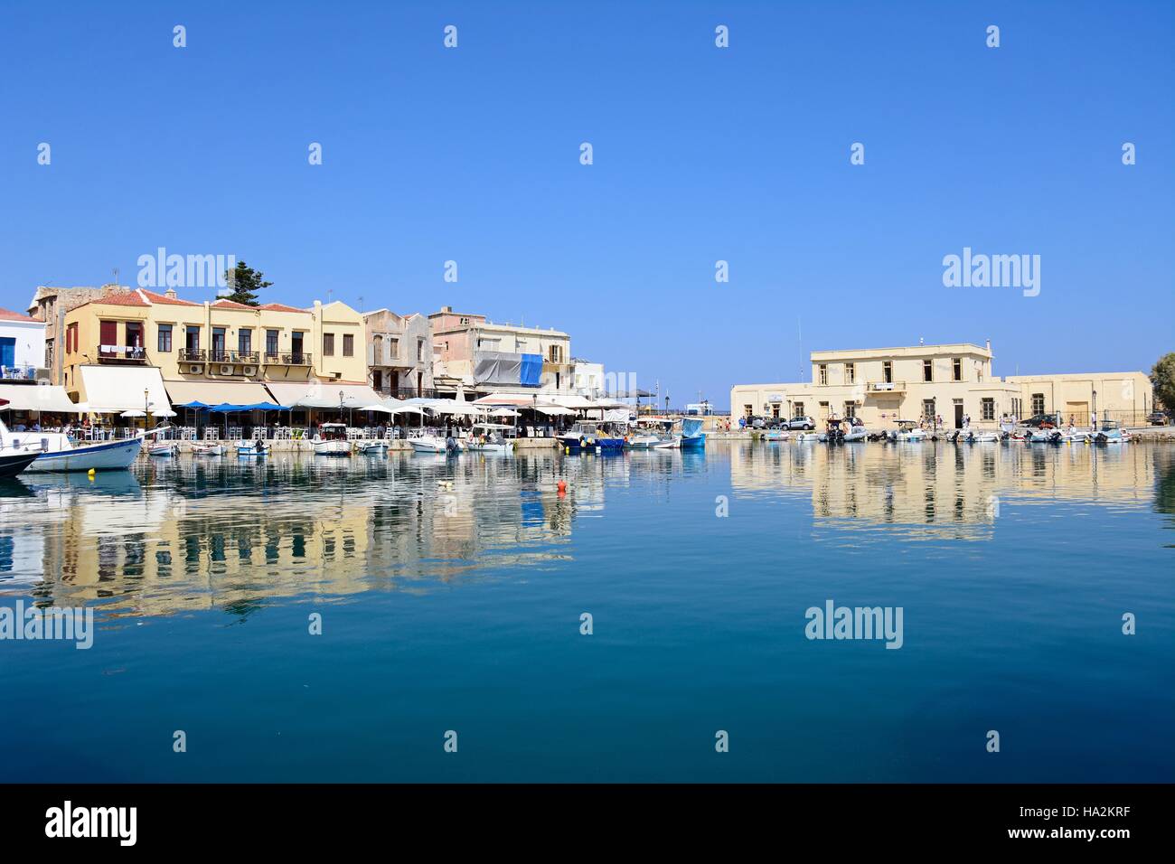 View of fishing boats and waterfront restaurants in the inner harbour ...
