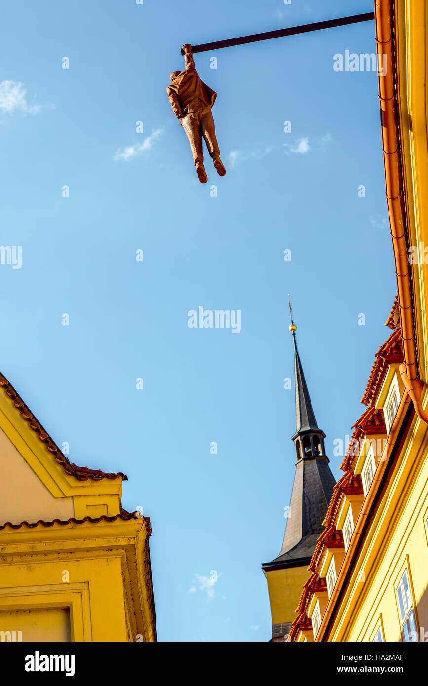 Man hanging out sculpture Stock Photo - Alamy