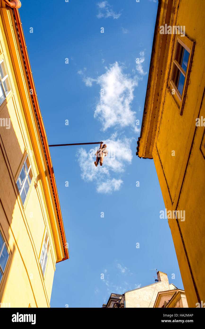 Man hanging out sculpture Stock Photo - Alamy