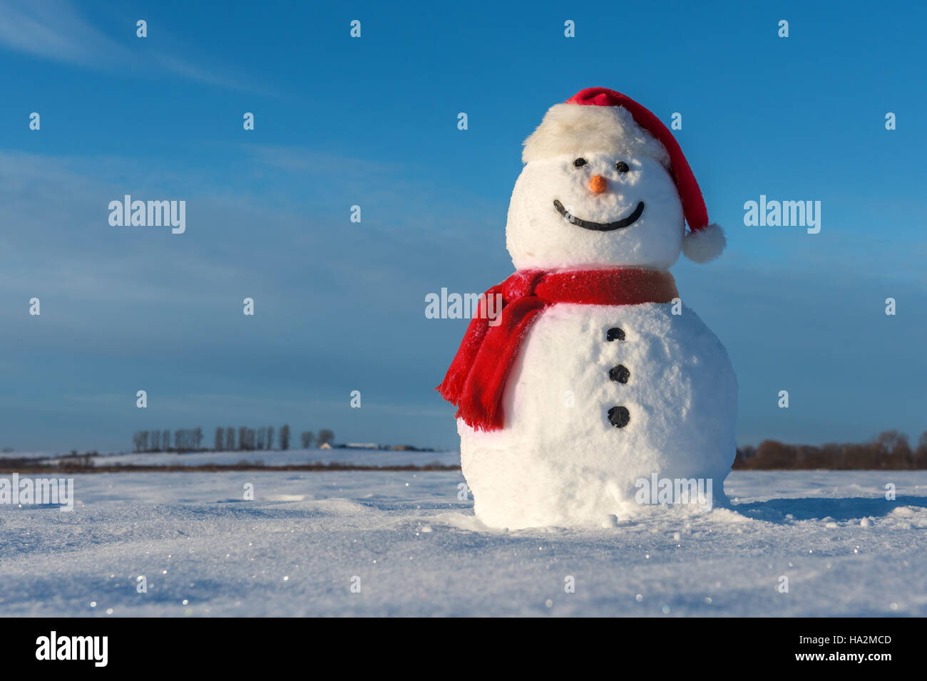 snowman on blue sky background Stock Photo - Alamy