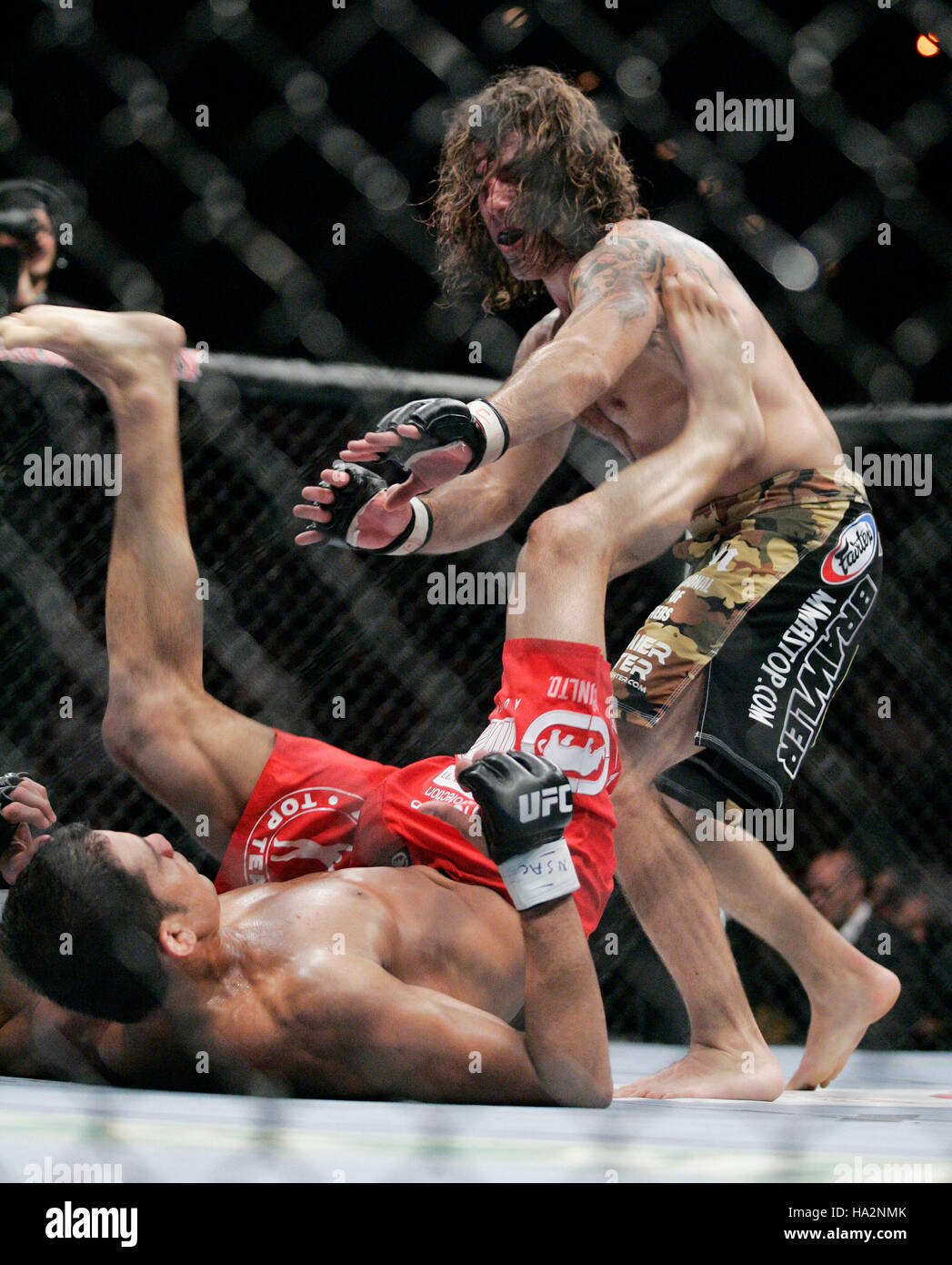 Clay Guida, top, fights Marcus Aurelio at UFC 74 during a mixed martial ...
