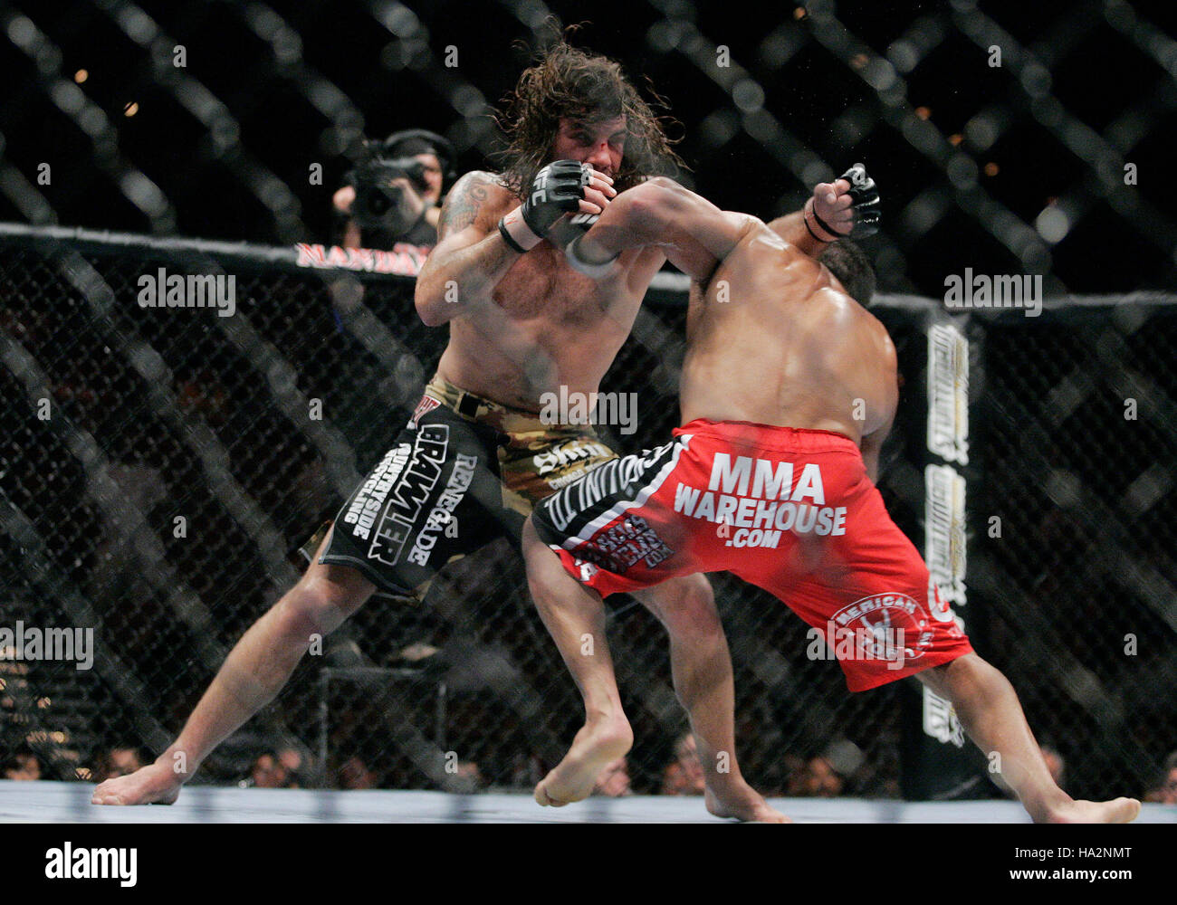 Clay Guida, left, fights Marcus Aurelio at UFC 74 during a mixed ...