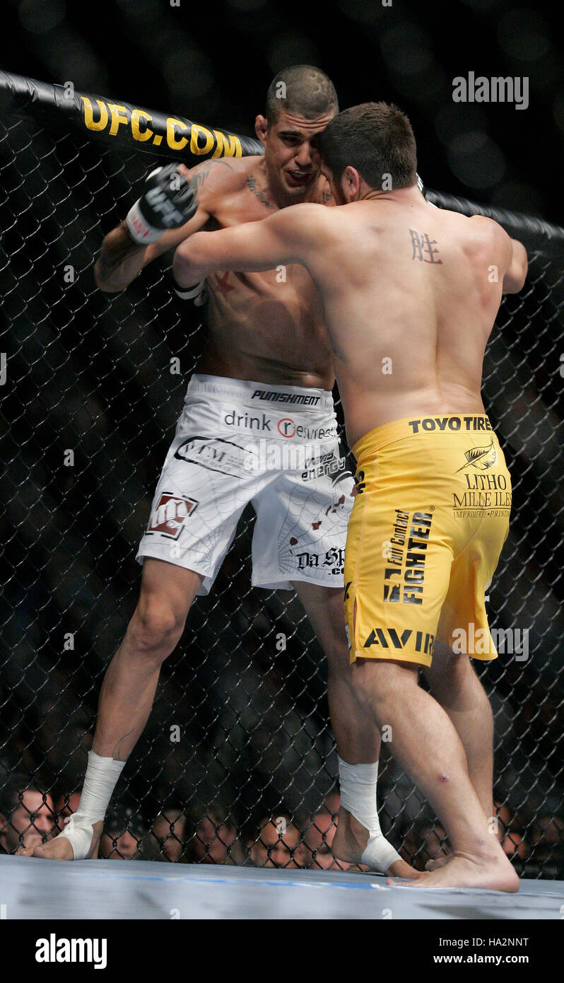 Patrick Cote, right, fights Kendall Grove at UFC 74 during a mixed ...