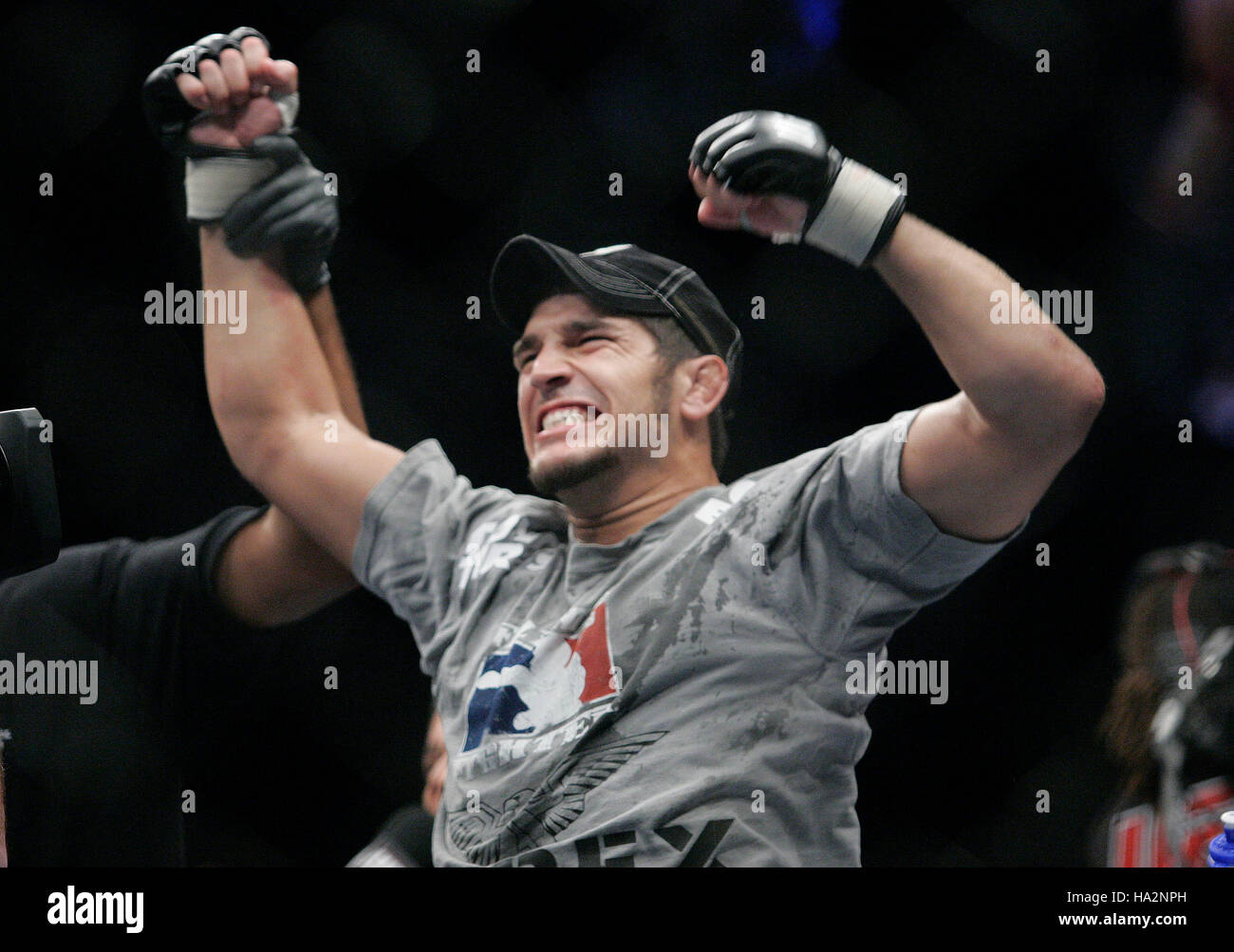 Patrick Cote celebrates his victory over Kendall Grove at UFC 74 during ...