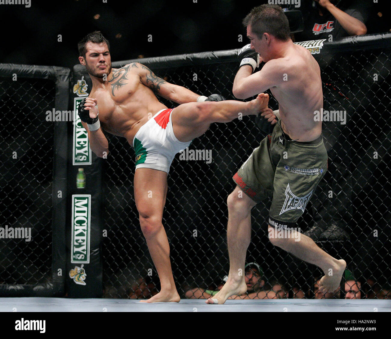 Roger Huerta, left, fights Alberto Crane at UFC 74 during a mixed ...