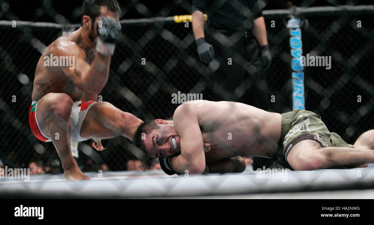 Roger Huerta, left, fight Alberto Crane at UFC 74 during a mixed ...