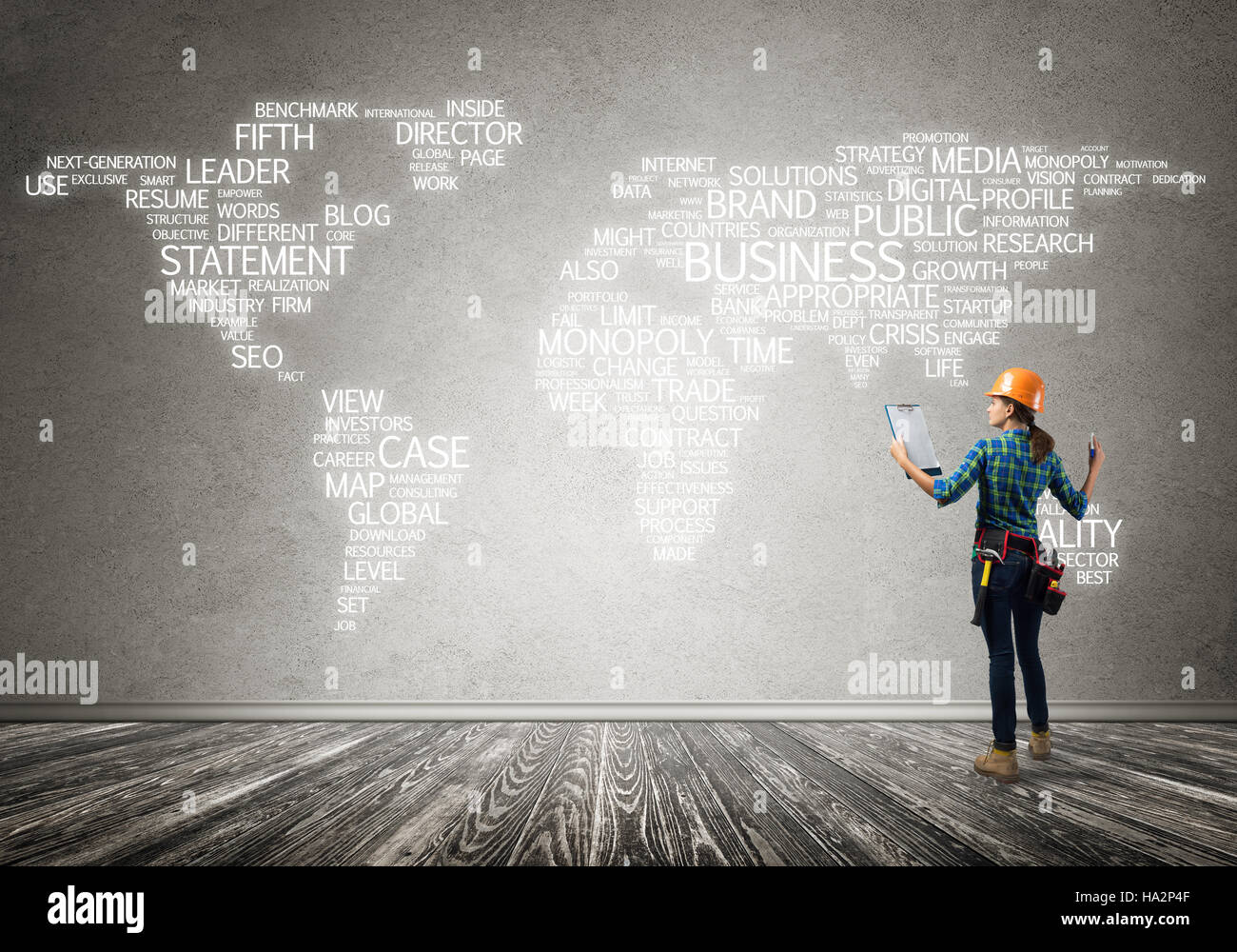 Female construction worker in room and globalization concept Stock ...