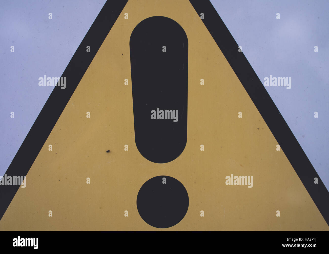 Yellow danger sign Stock Photo - Alamy