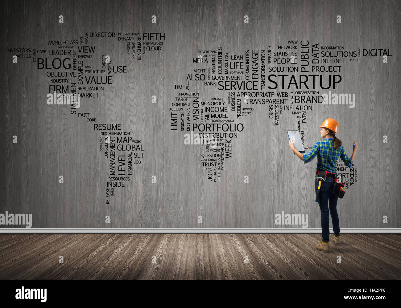 Female construction worker in room and globalization concept Stock ...