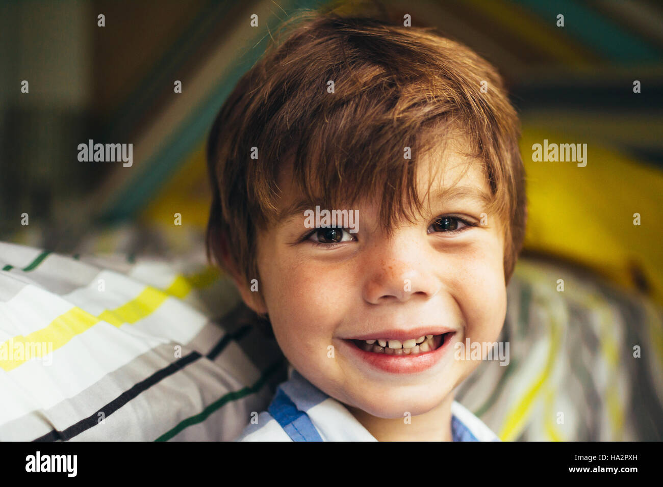 Portrait of a smiling boy Stock Photo - Alamy