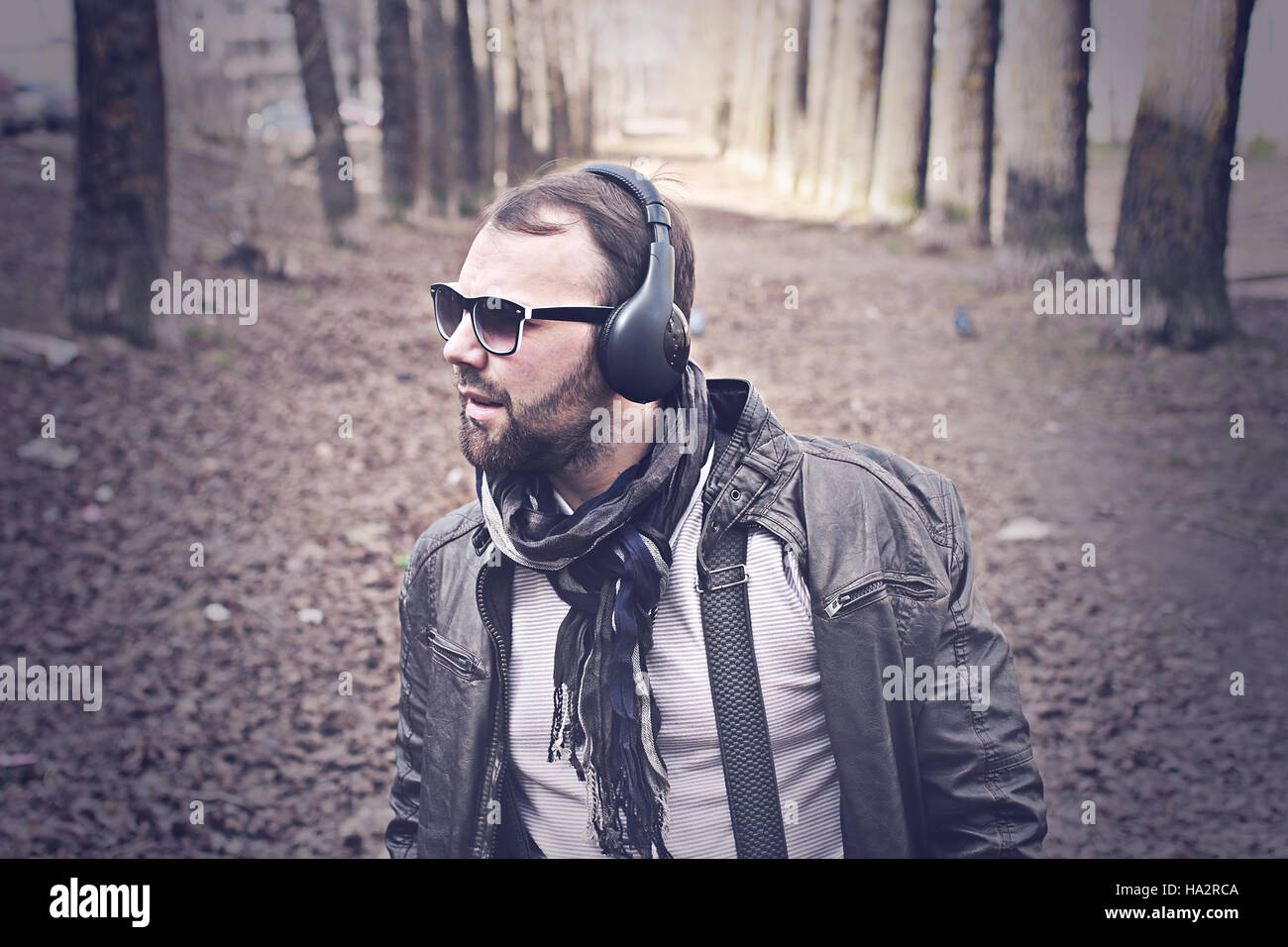 retro toned effected photo of alone man on street Stock Photo - Alamy