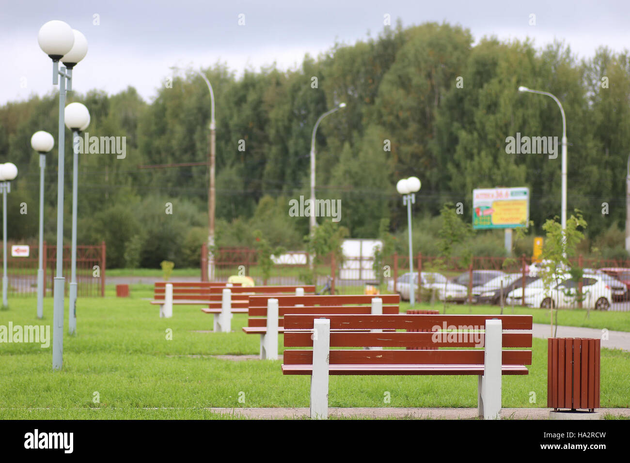 many bench in park Stock Photo - Alamy