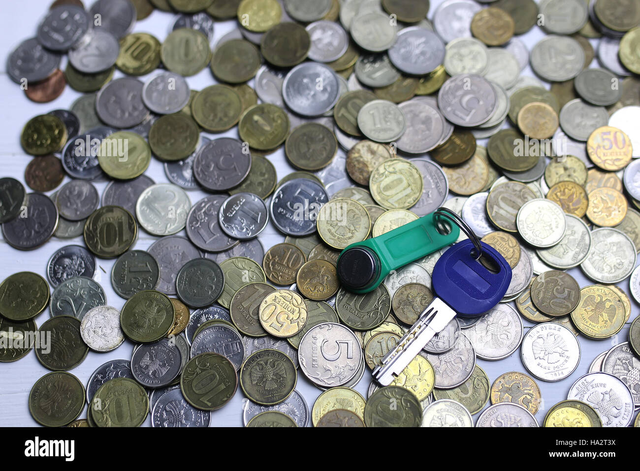 key and russian coins on background Stock Photo - Alamy