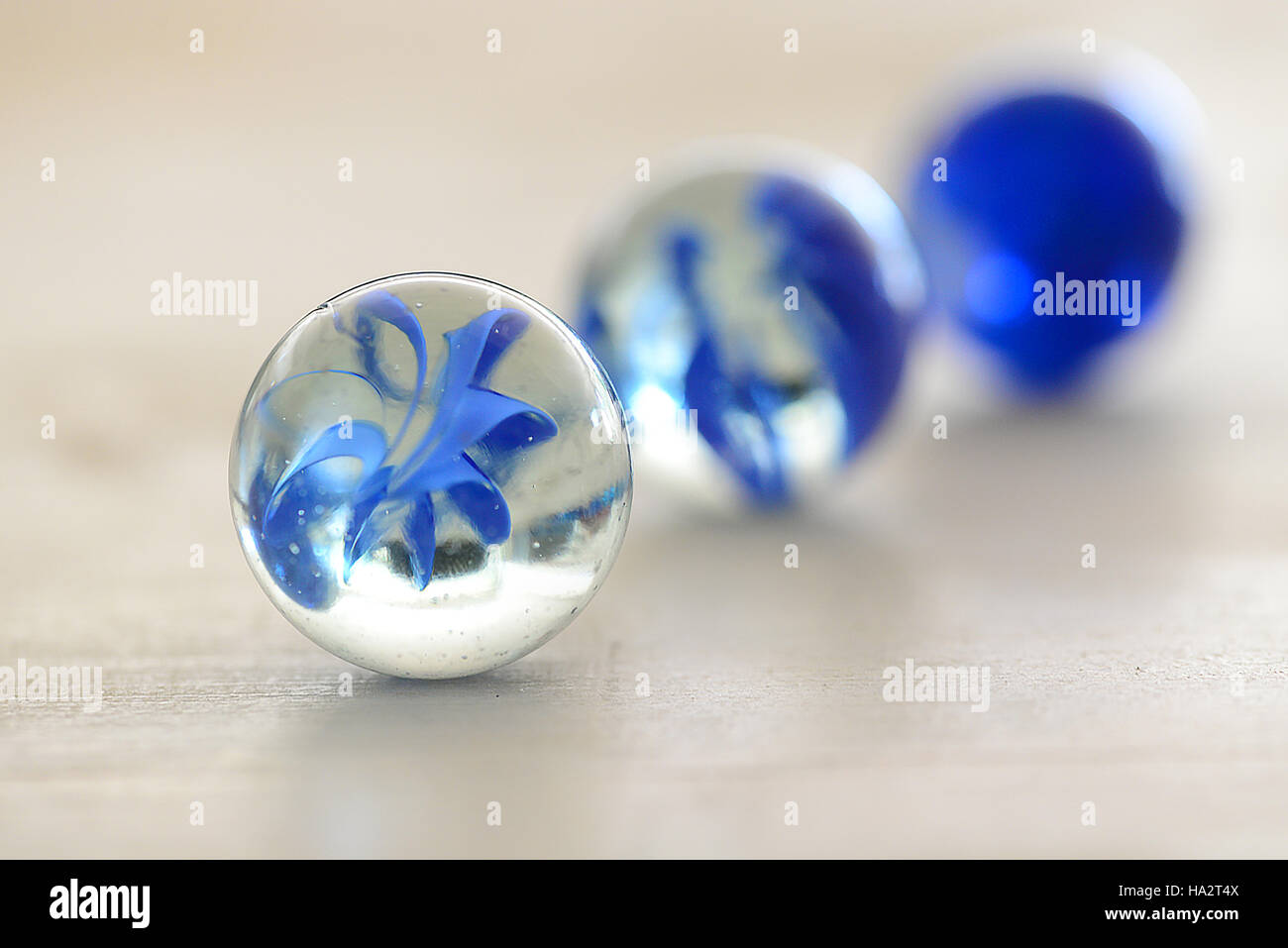 Row of marbles Stock Photo - Alamy