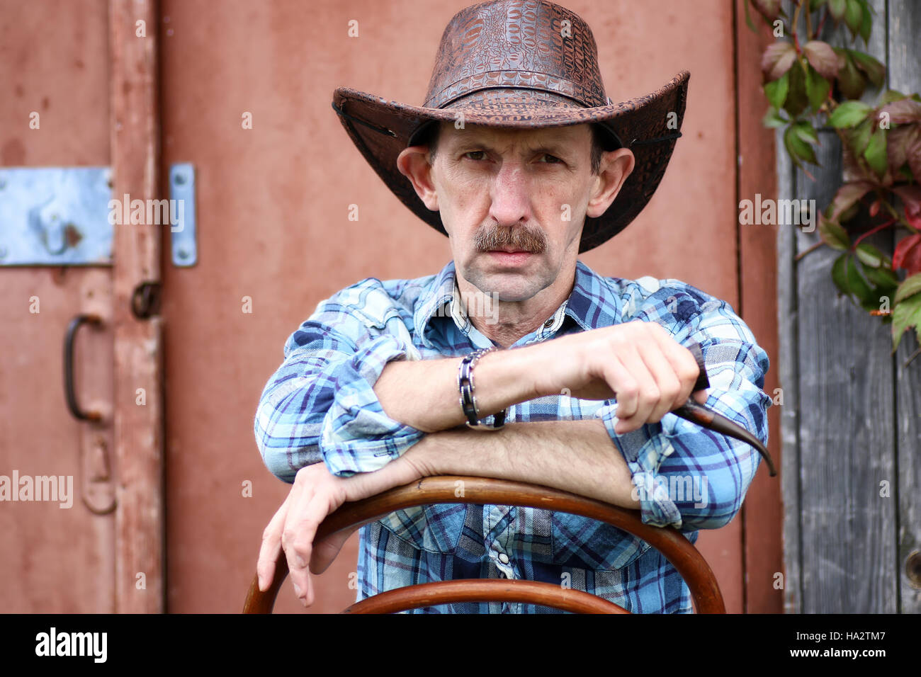 cowboy man smoke pipe Stock Photo - Alamy