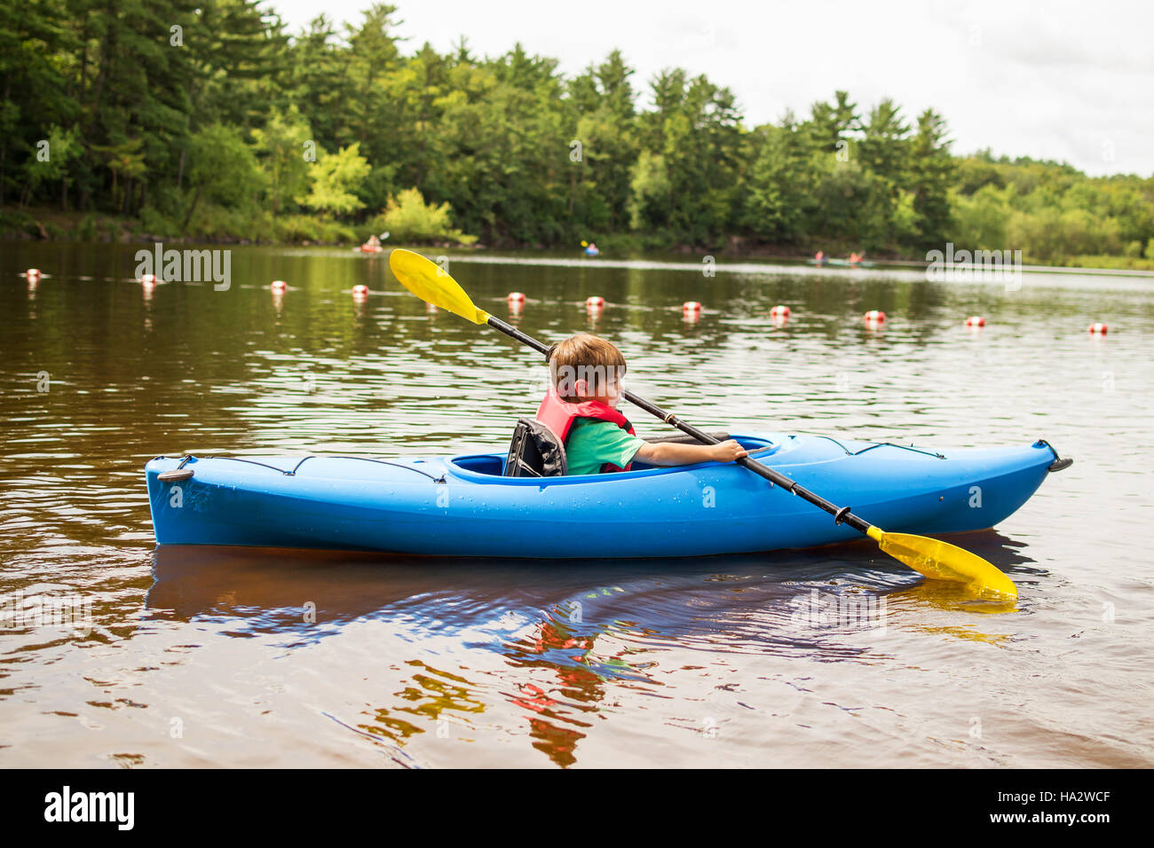 Boys in kayak hi-res stock photography and images - Alamy