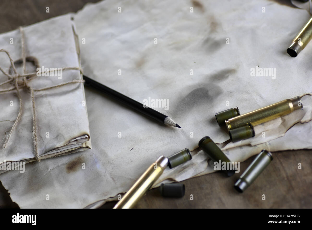 bullet and retro paper on the table Stock Photo - Alamy