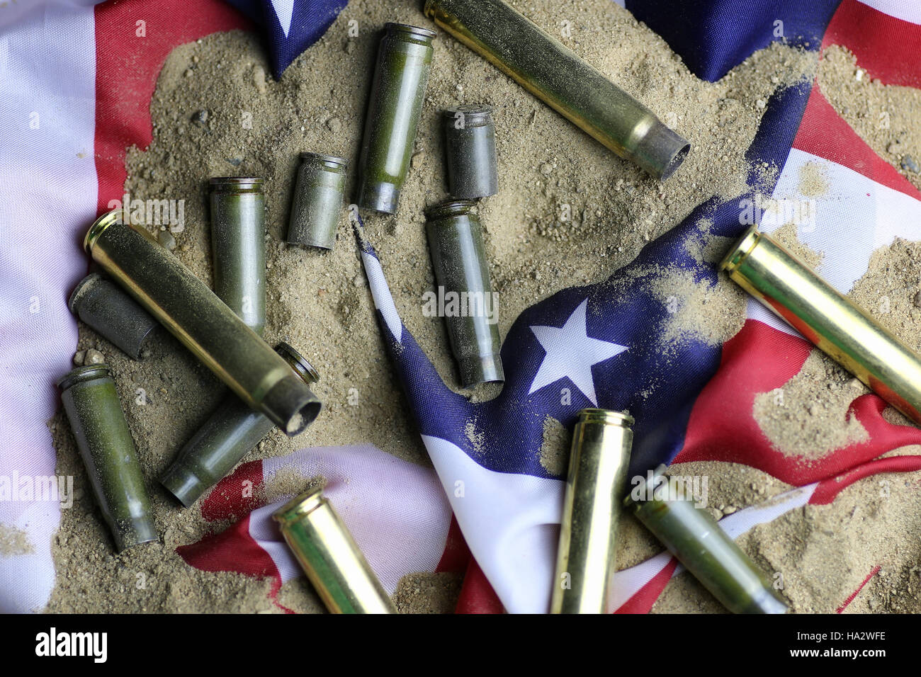 bullet and usa flag in the sand war Stock Photo - Alamy