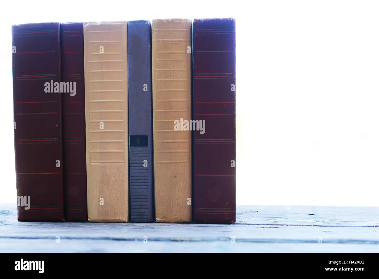 books standing on a table Stock Photo - Alamy