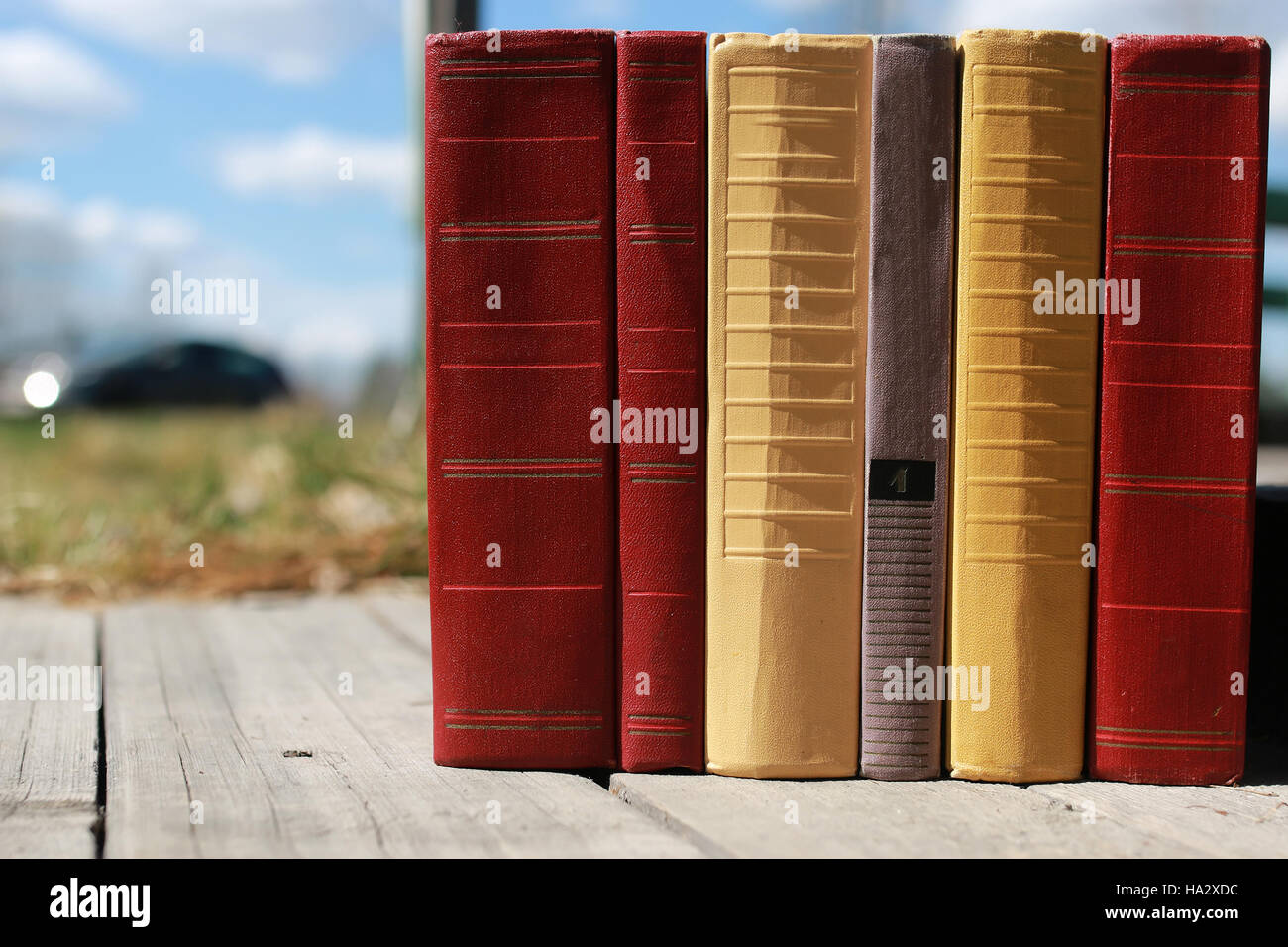 books standing on a table Stock Photo - Alamy