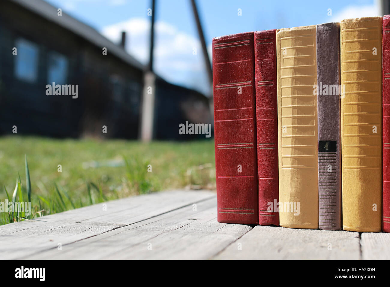 books standing on a table Stock Photo - Alamy